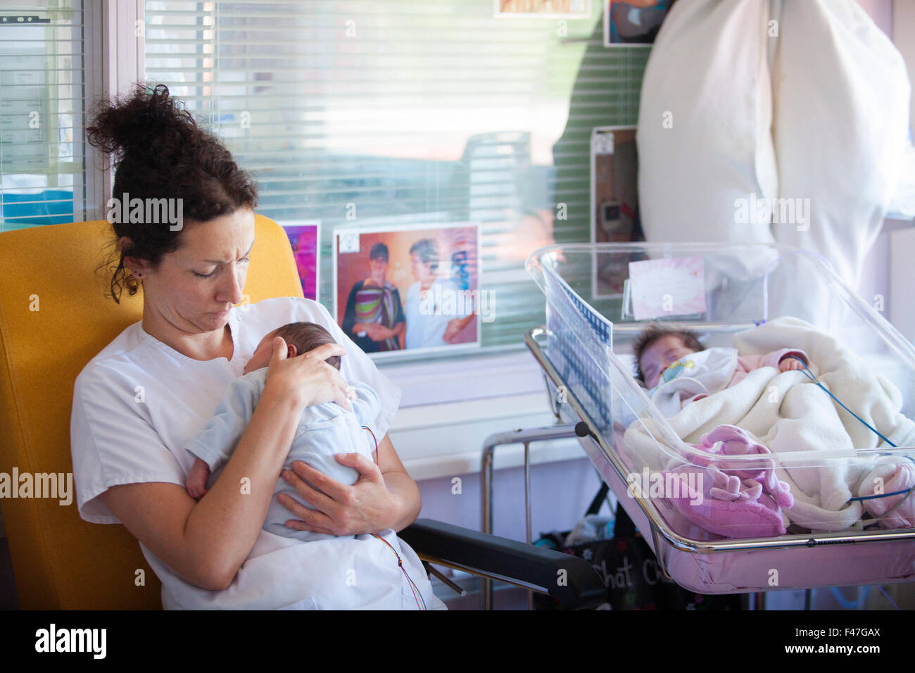 Nurse new born babies in hi-res stock photography and images - Alamy