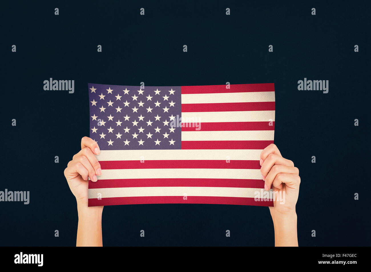 Composite image of hand showing card Stock Photo - Alamy