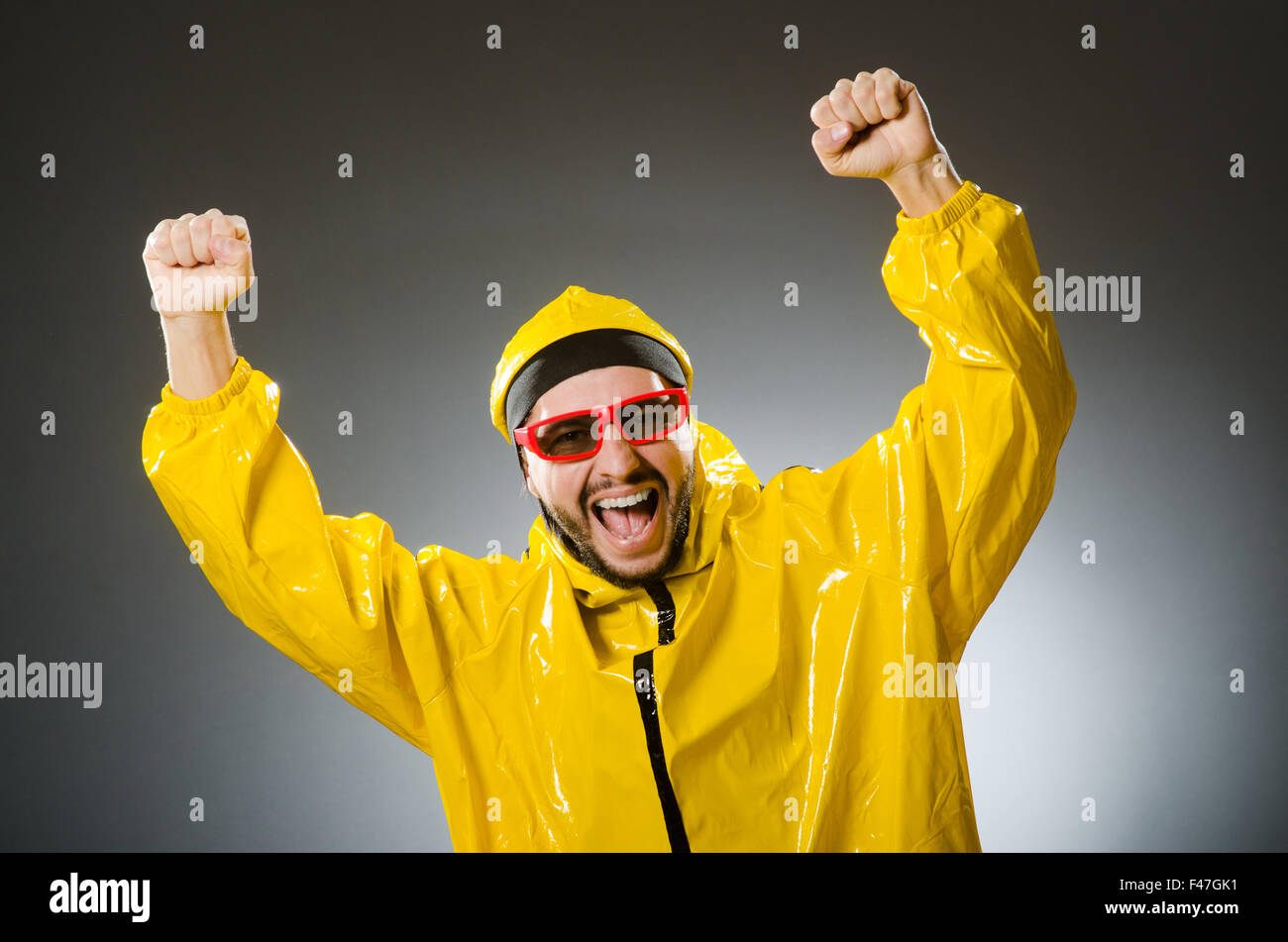 Funny man wearing yellow suit Stock Photo - Alamy