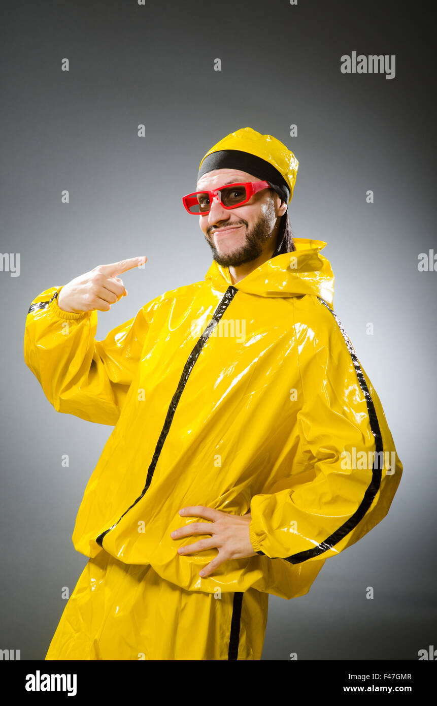 Funny man wearing yellow suit Stock Photo - Alamy