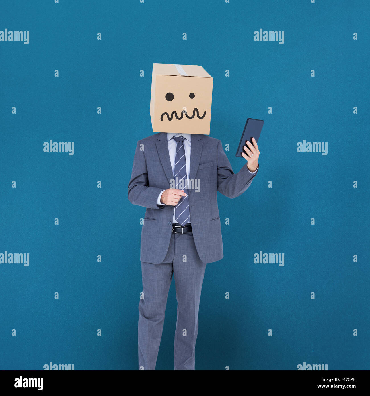 Anonymous businessman holding smartphone hi-res stock photography and ...