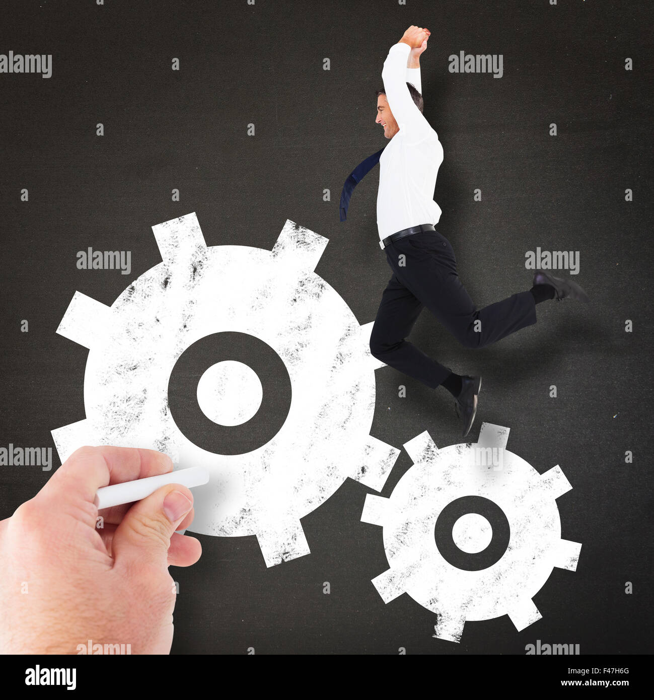 Excited businessman jumping holding hi-res stock photography and images ...