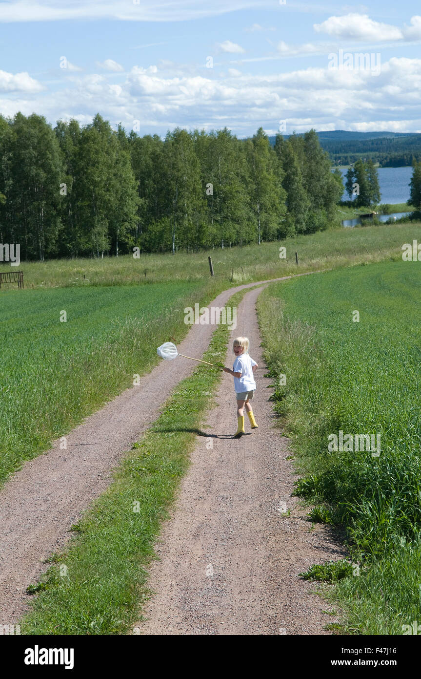 Girl with butterfly net hi-res stock photography and images - Alamy