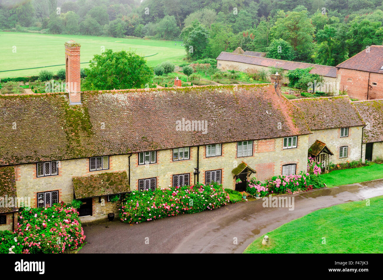 Cottages in Cowdray Park next to the ruins of Cowdray House, Midhurst ...