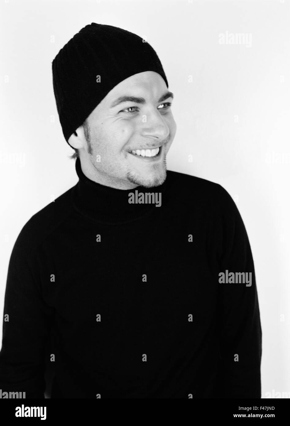 Man wearing a cap Black and White Stock Photos & Images - Alamy