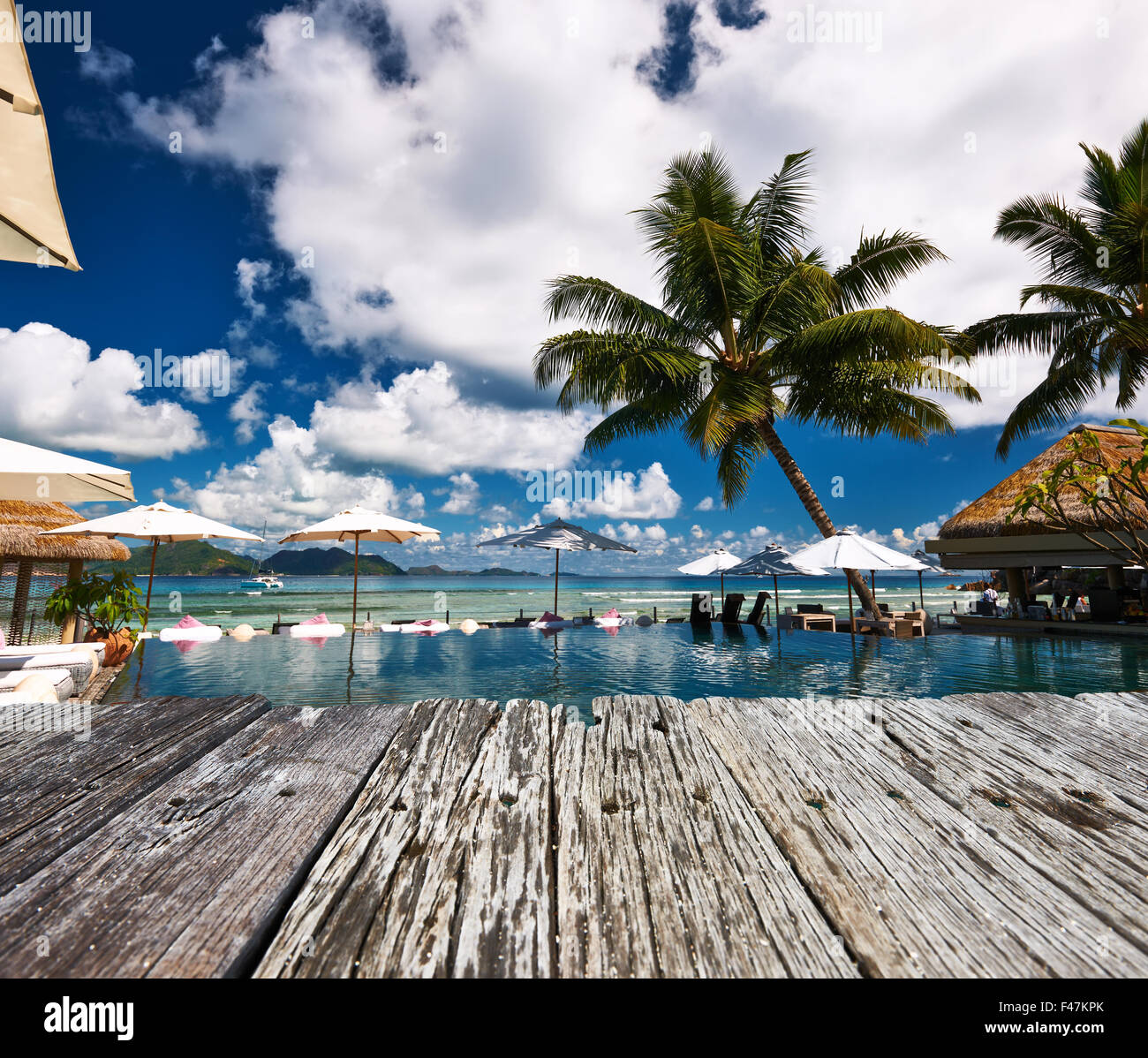 Luxury poolside jetty Stock Photo - Alamy