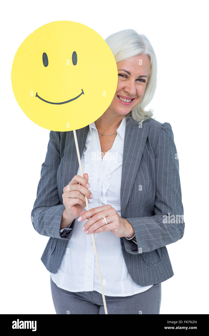 Smiley covering face hi-res stock photography and images - Alamy