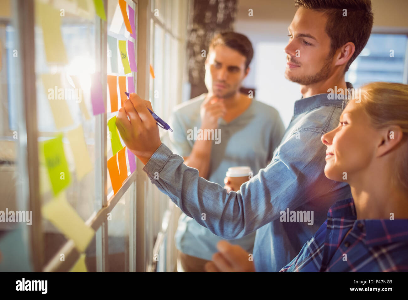 Young creative business people Stock Photo - Alamy