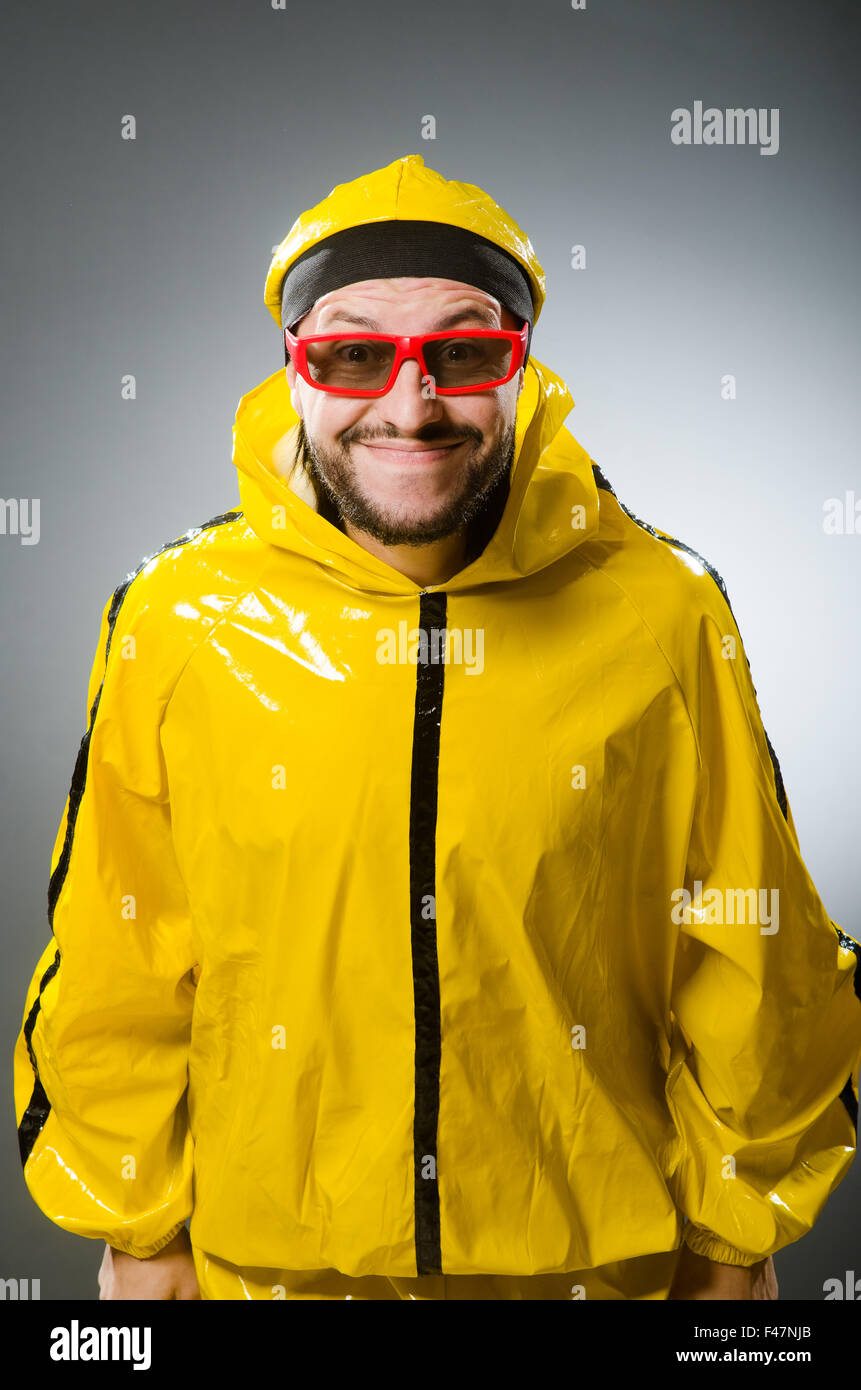 Funny man wearing yellow suit Stock Photo - Alamy