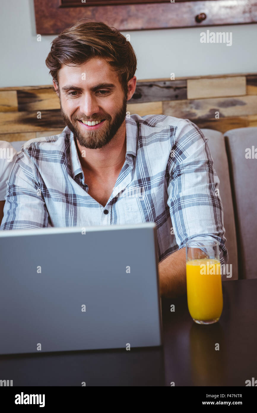 young man working on his computer Stock Photo - Alamy