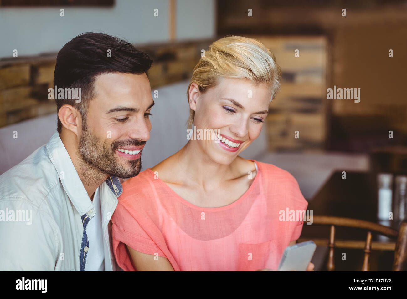 couple hanging out in a coffee shop Stock Photo - Alamy