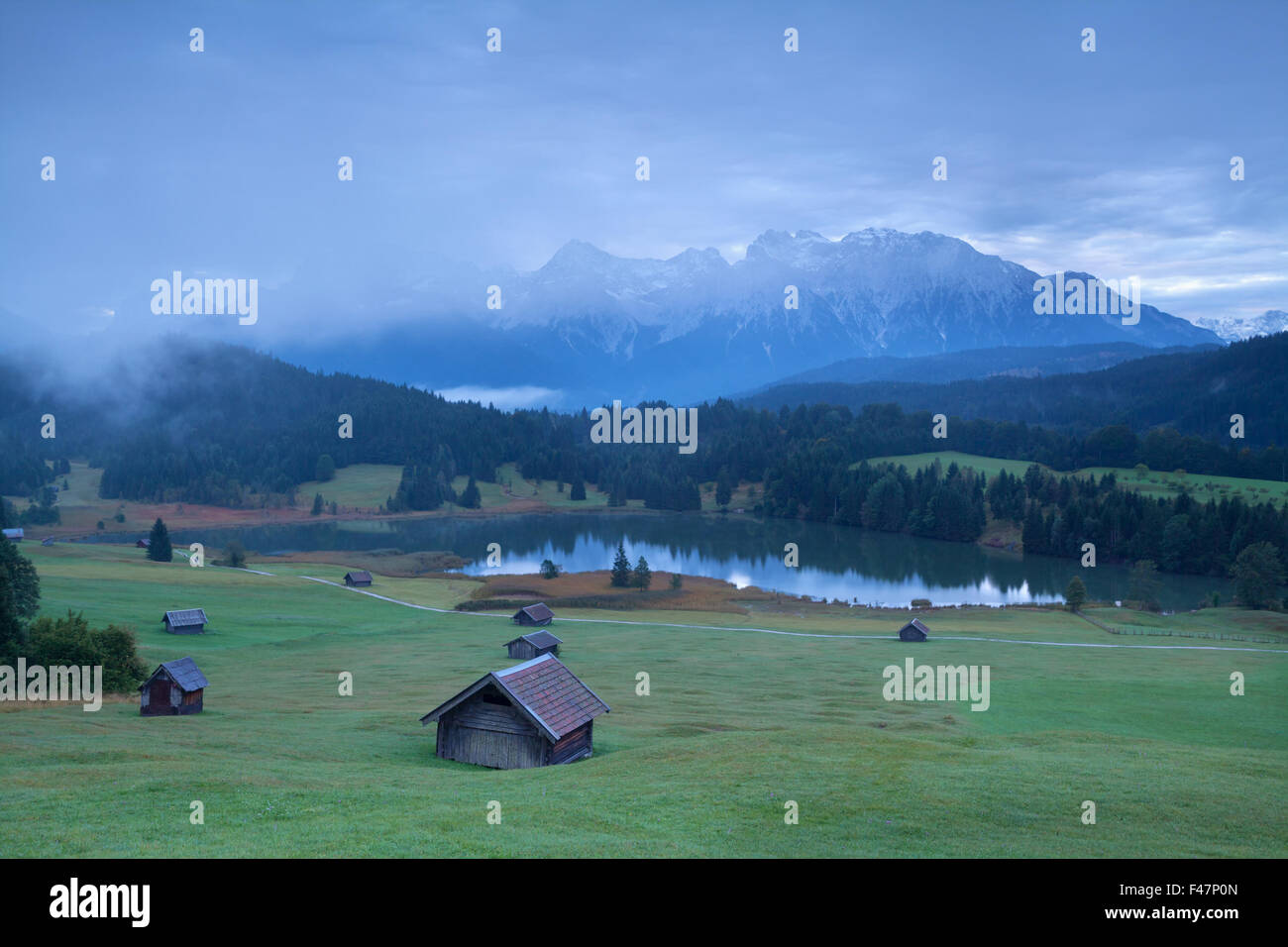 wooden hut on alpine meadows in morning, Germany Stock Photo - Alamy