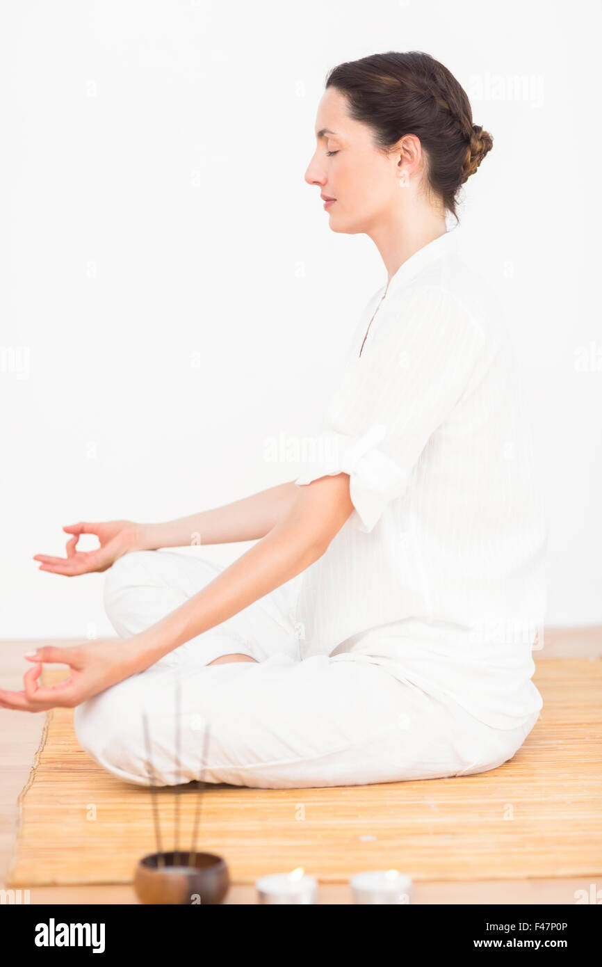 A woman in a meditation position Stock Photo - Alamy