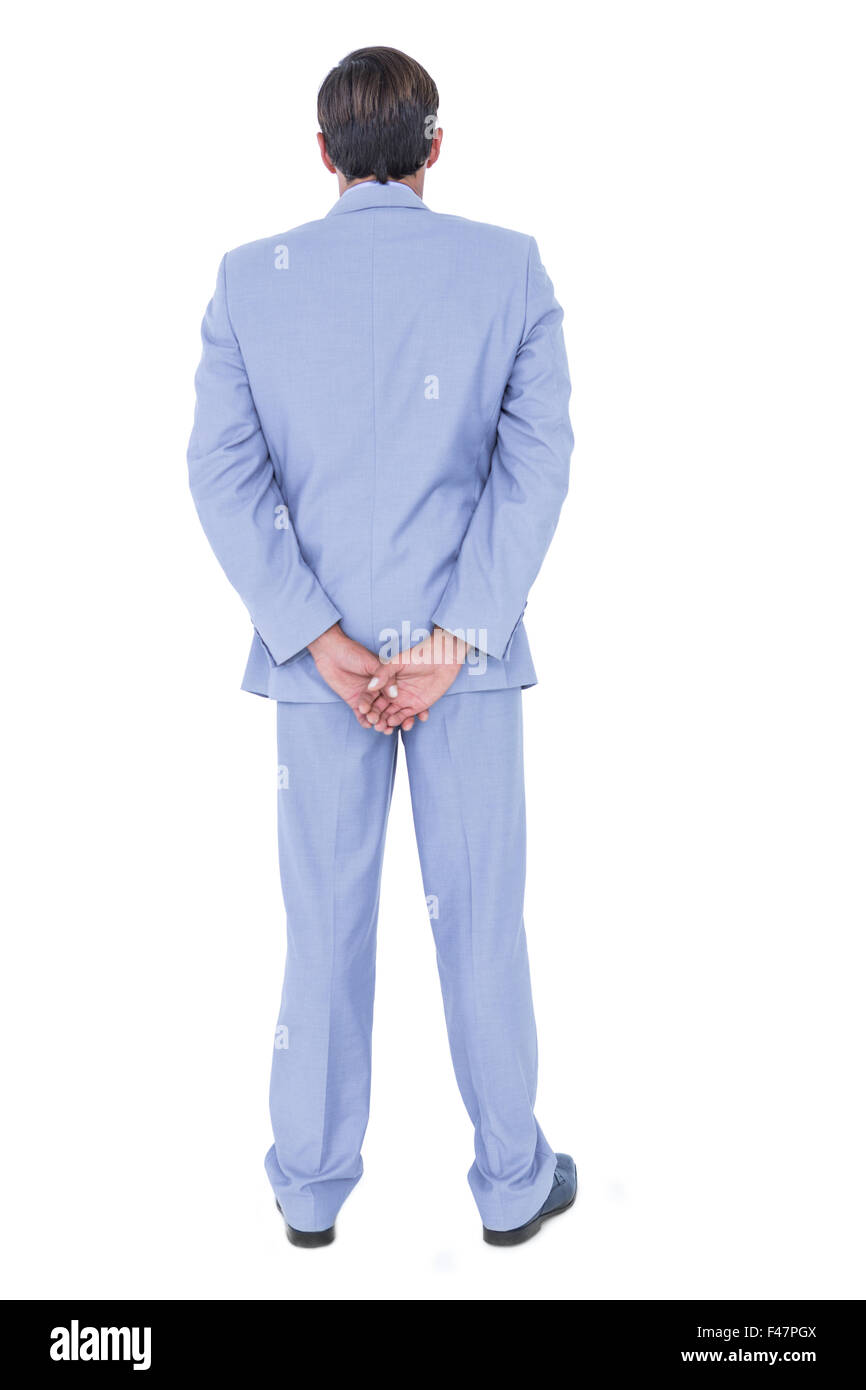 A back turned businessman on a background Stock Photo - Alamy