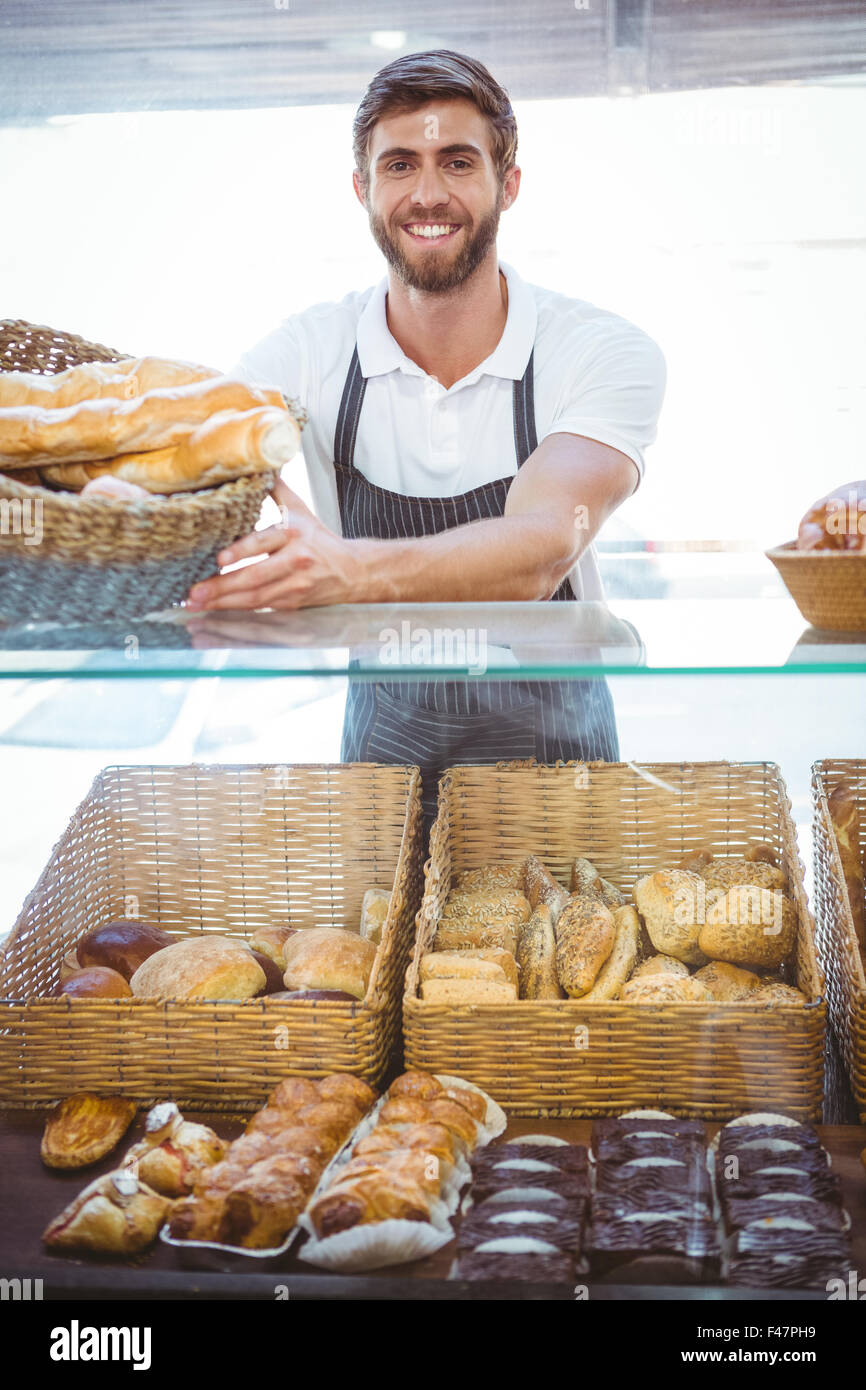 Smiling male restaurant worker posing hi-res stock photography and ...