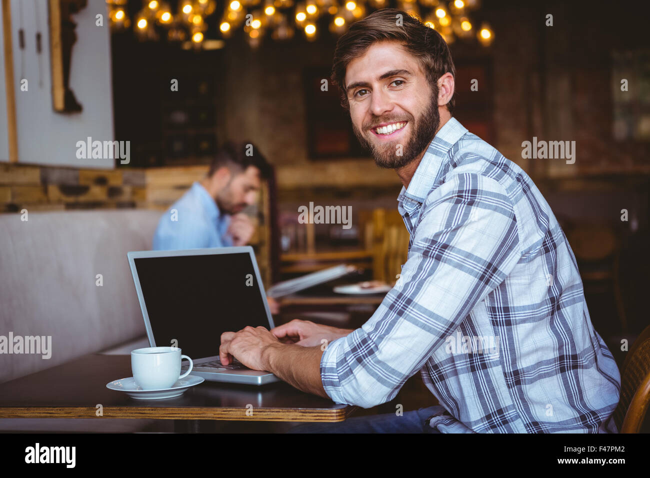 young man working on his computer Stock Photo - Alamy