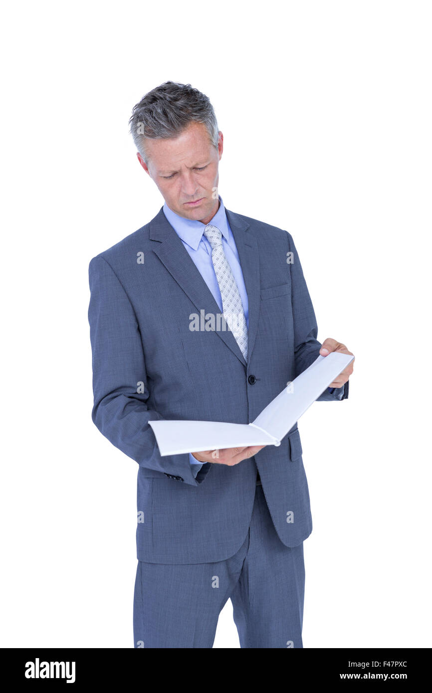 Happy businessman holding files Stock Photo - Alamy