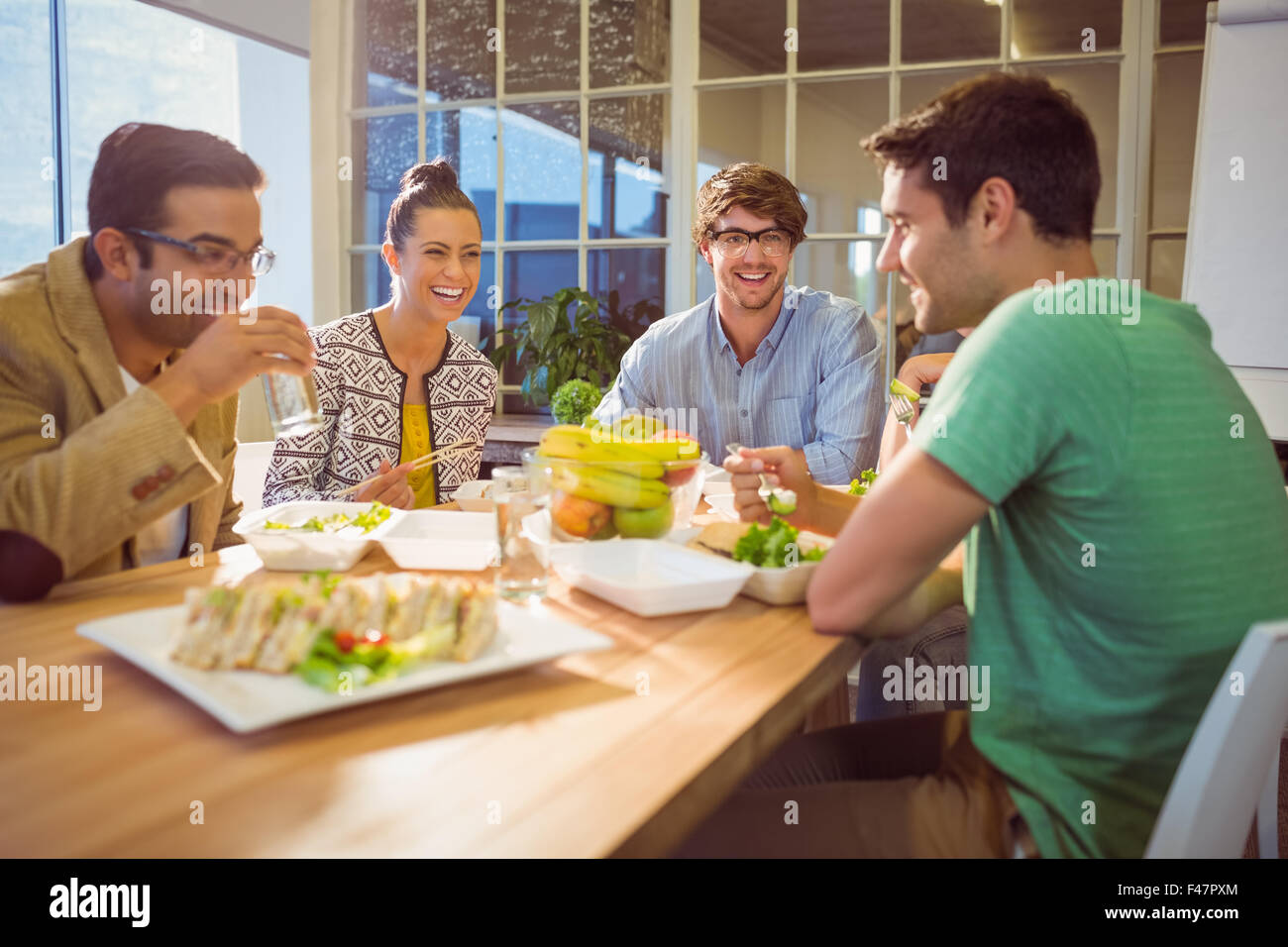 Business people having lunch Stock Photo - Alamy