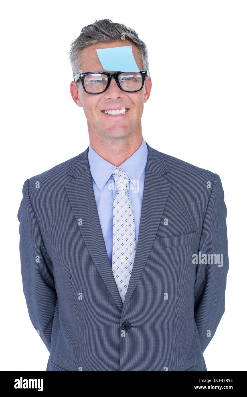 Businessman with post it on his face Stock Photo - Alamy