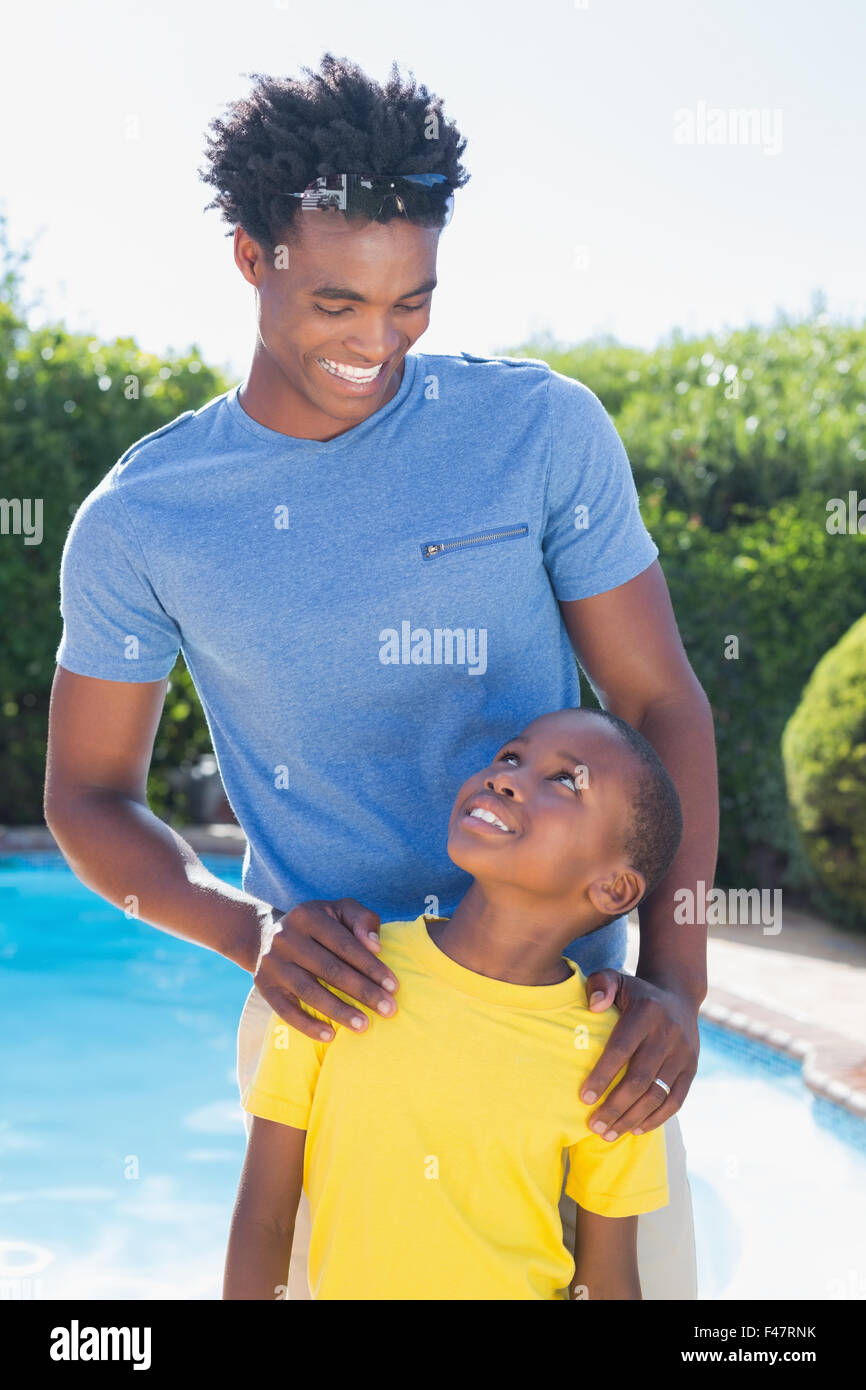 Happy father and son smiling at each other Stock Photo - Alamy