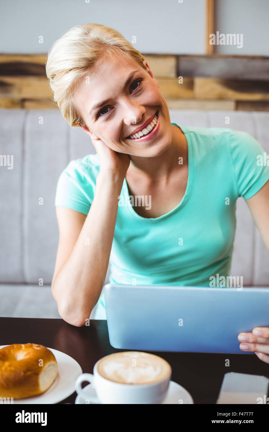 Pretty blonde using laptop computer Stock Photo - Alamy