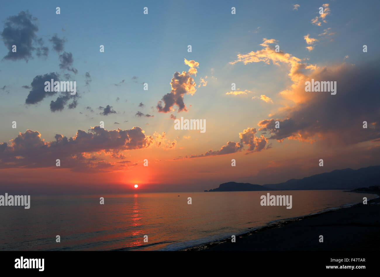 gorgeous very beautiful sunset over the sea Stock Photo - Alamy