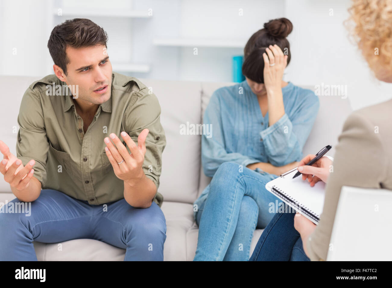 Psychologist helping a couple with relationship difficulties Stock ...
