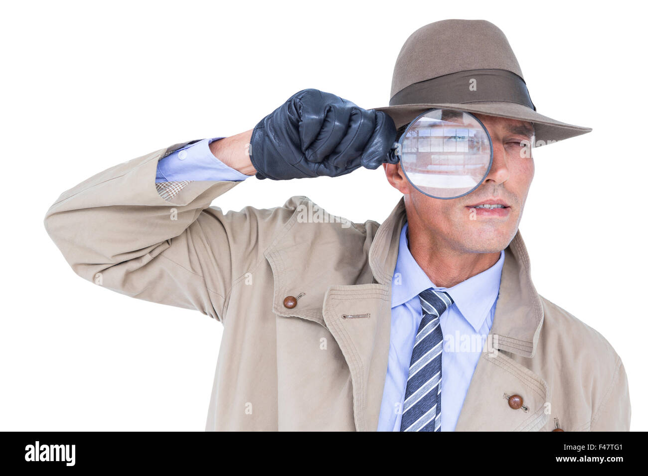 Spy looking through magnifier Stock Photo - Alamy
