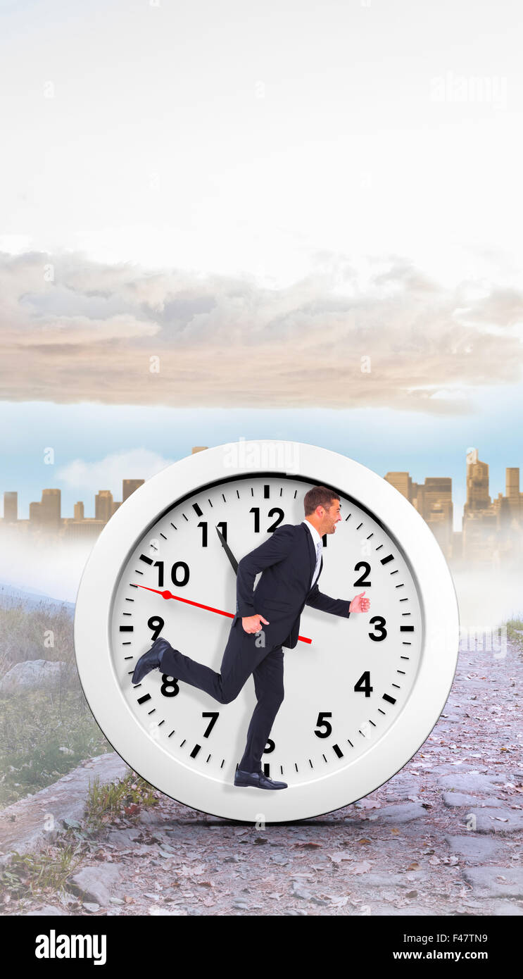 Composite image of businessman running Stock Photo - Alamy