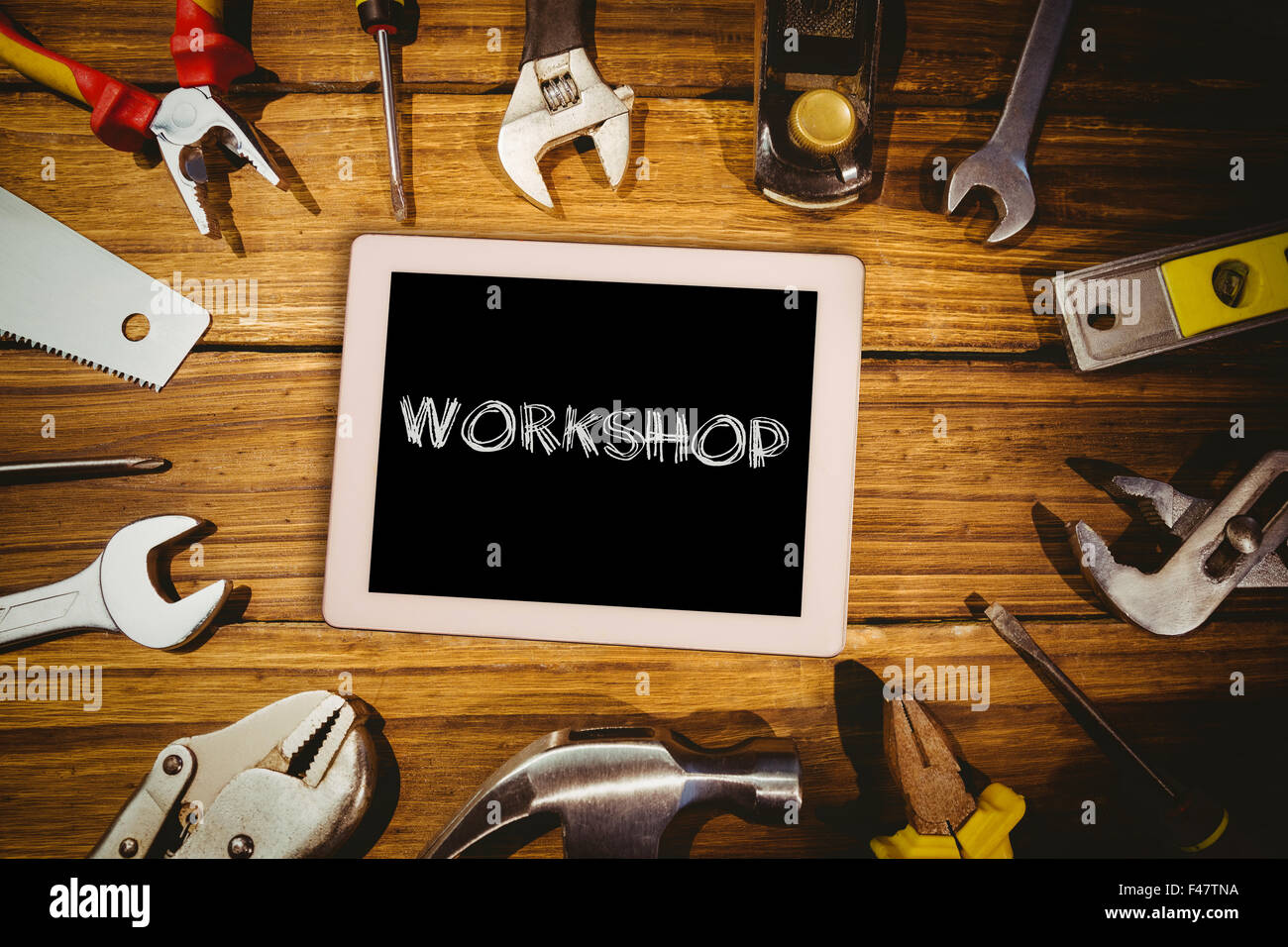 Workshop against tools on desk Stock Photo - Alamy