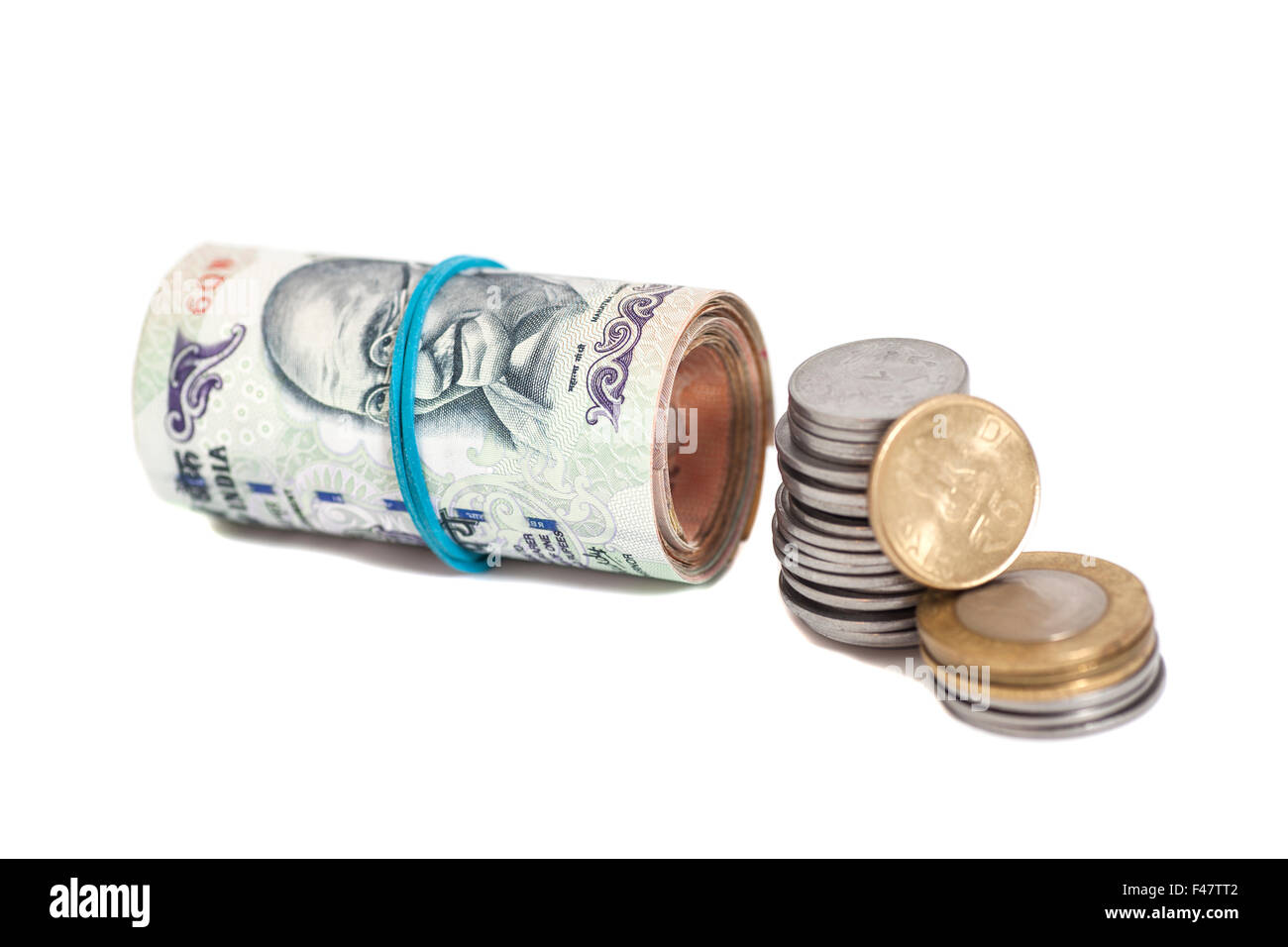 Roll of Indian Currency Rupees Notes and Coins Stock Photo - Alamy