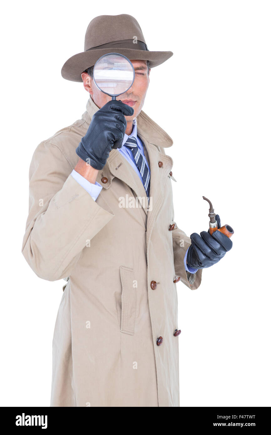 Spy looking through magnifier Stock Photo - Alamy