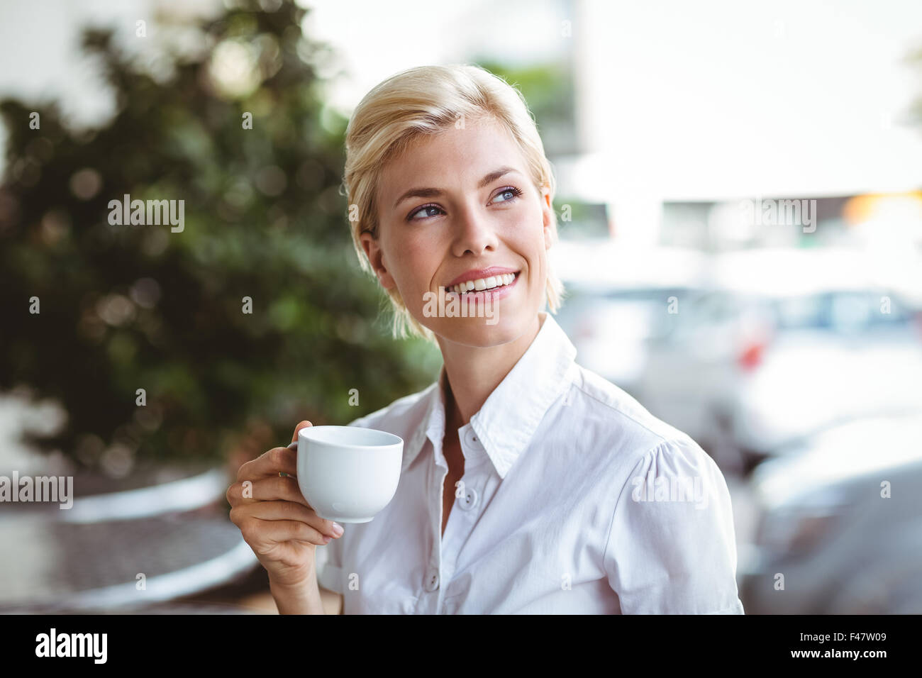 Cafe owner smiling camera hi-res stock photography and images - Alamy