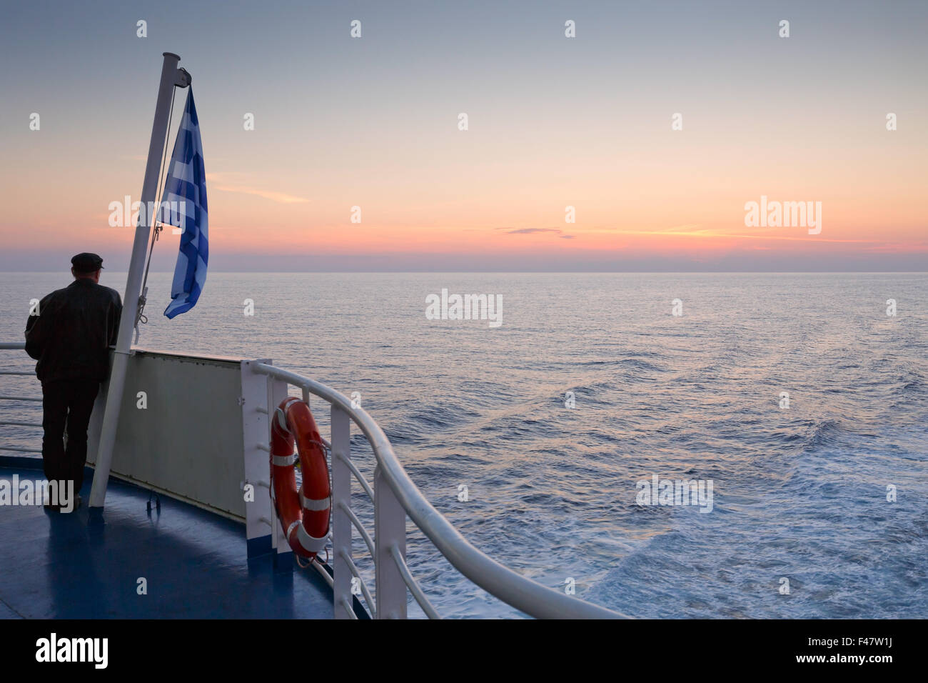 Man on the deck of a ferry in Agean sea, Greece Stock Photo - Alamy