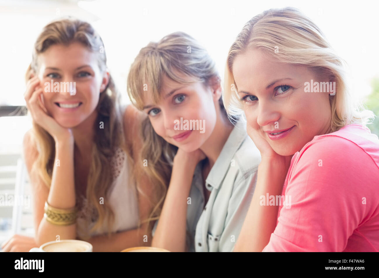 Beautiful women looking at camera Stock Photo - Alamy