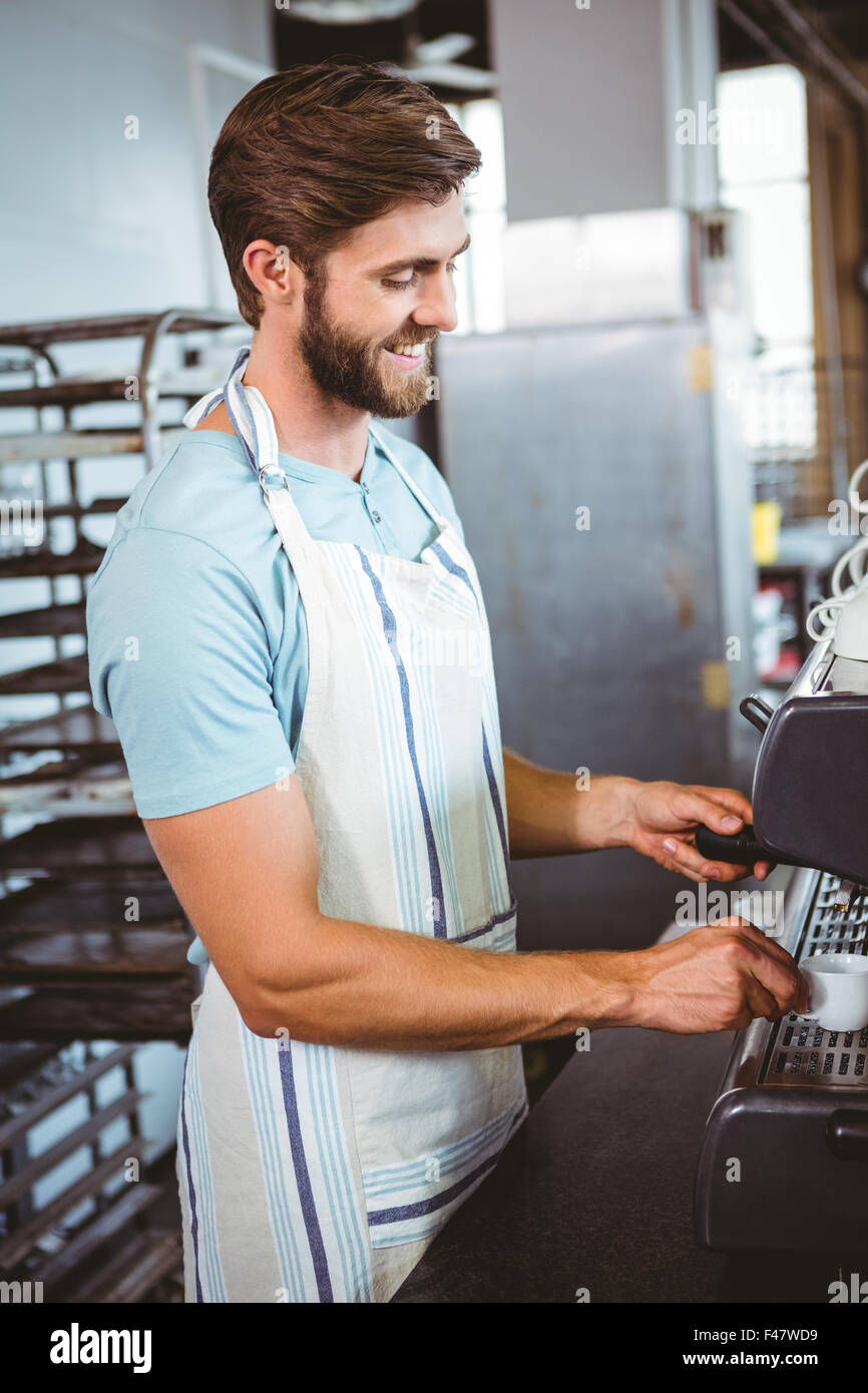 happy worker making coffee Stock Photo - Alamy