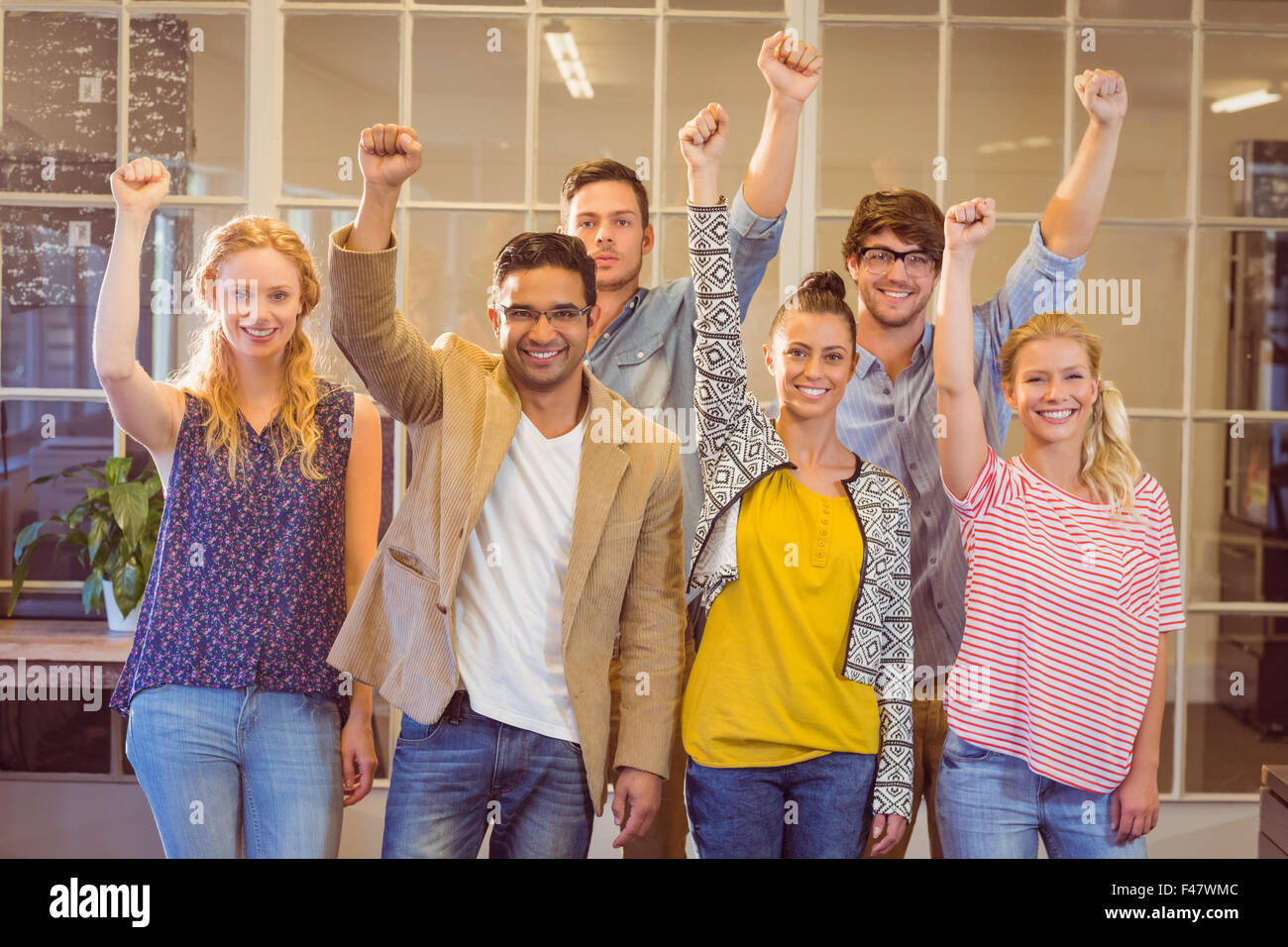 Business people cheering camera hi-res stock photography and images - Alamy