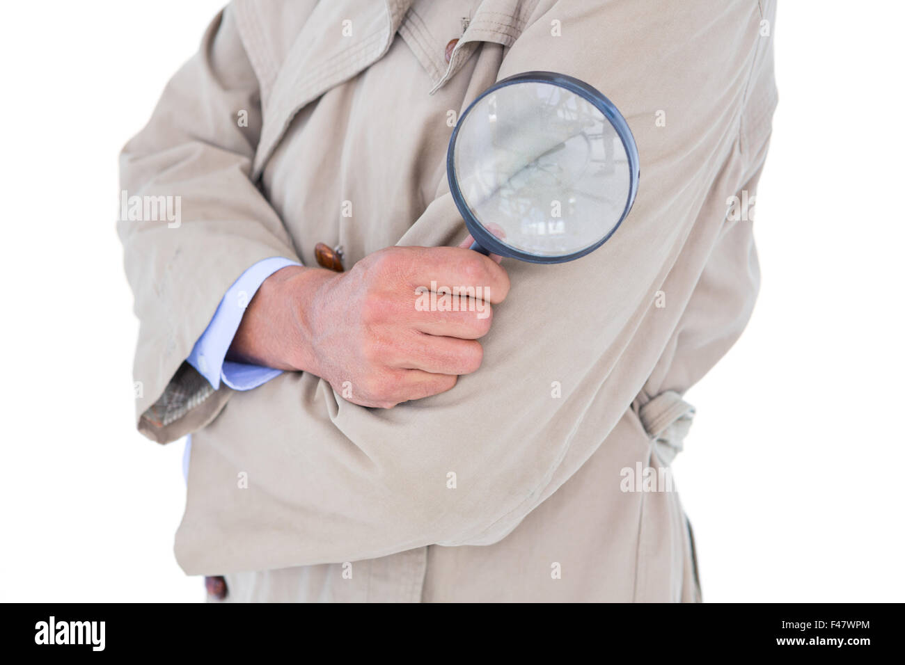 Spy looking through magnifier Stock Photo - Alamy