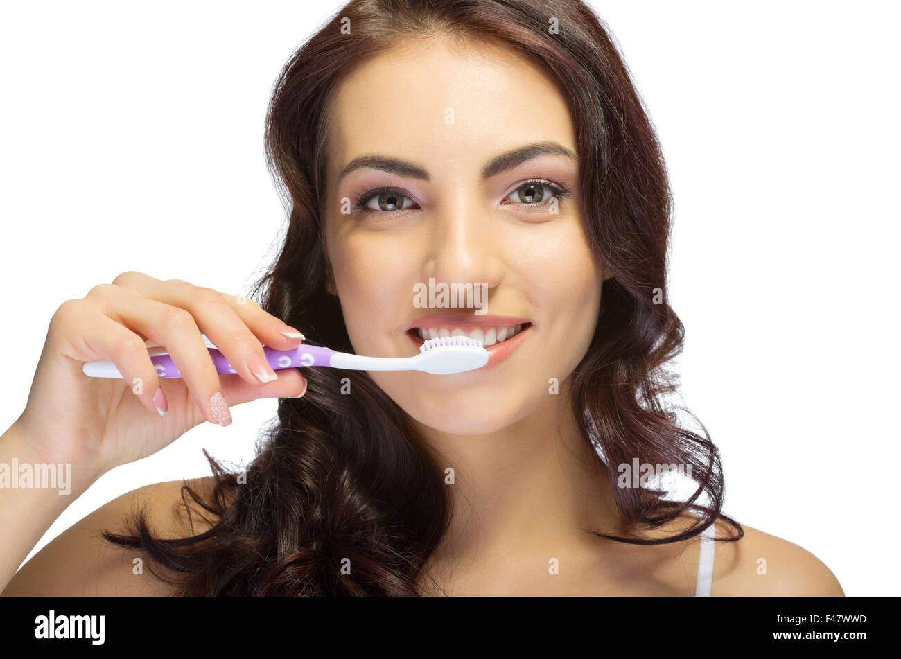 Young girl with toothbrush isolated Stock Photo - Alamy