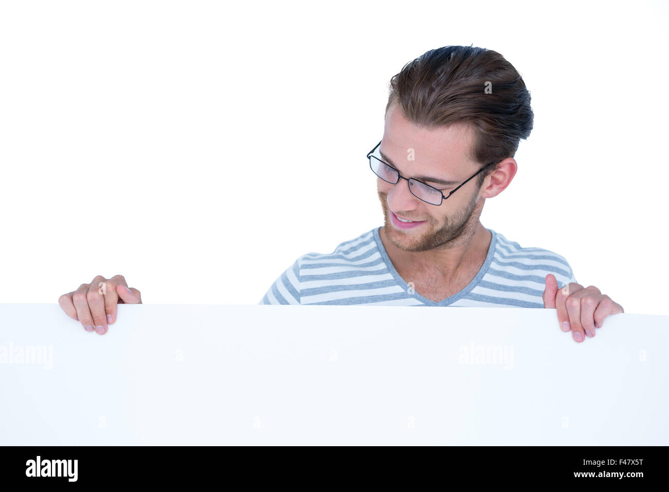 Handsome man looking at blank paper Stock Photo - Alamy