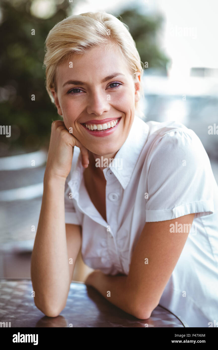Cafe owner smiling at the camera Stock Photo - Alamy