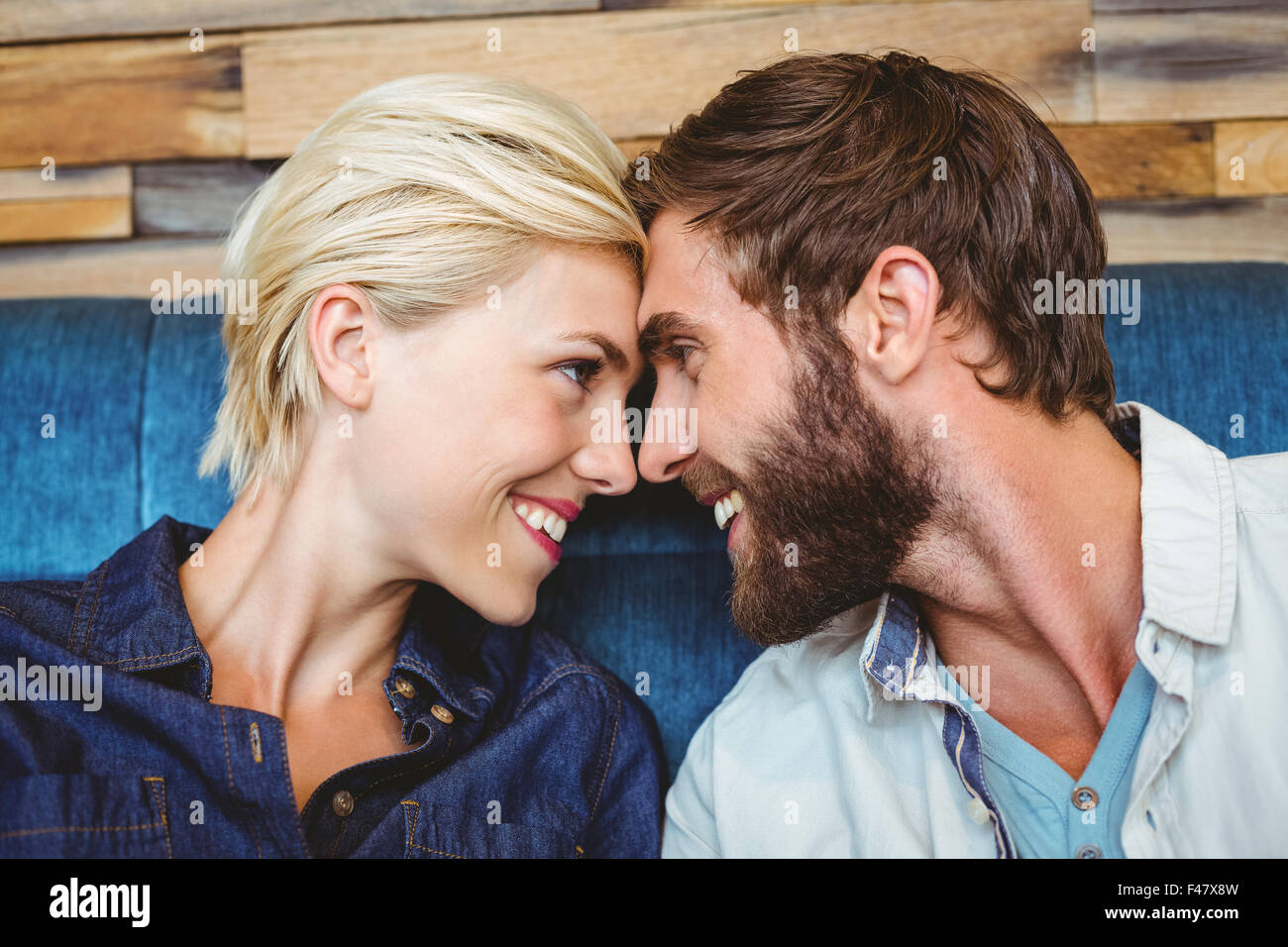 Cute couple on a date giving head to head Stock Photo - Alamy