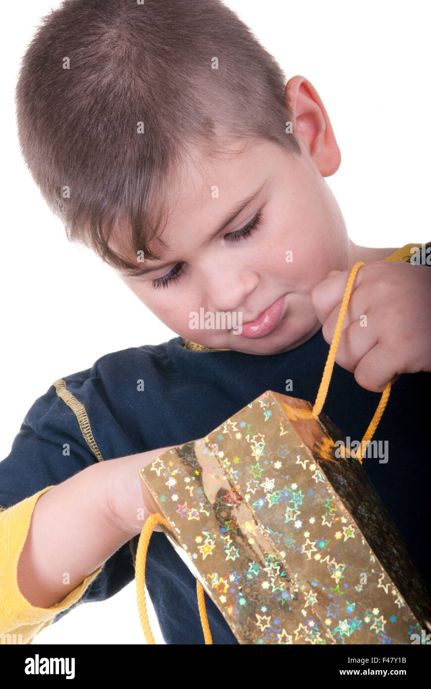 Boy searches for a gift Stock Photo - Alamy