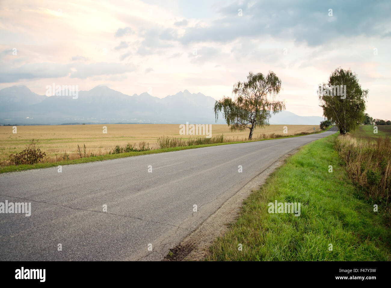 sunrise over a road to High Tatra mountains Stock Photo - Alamy