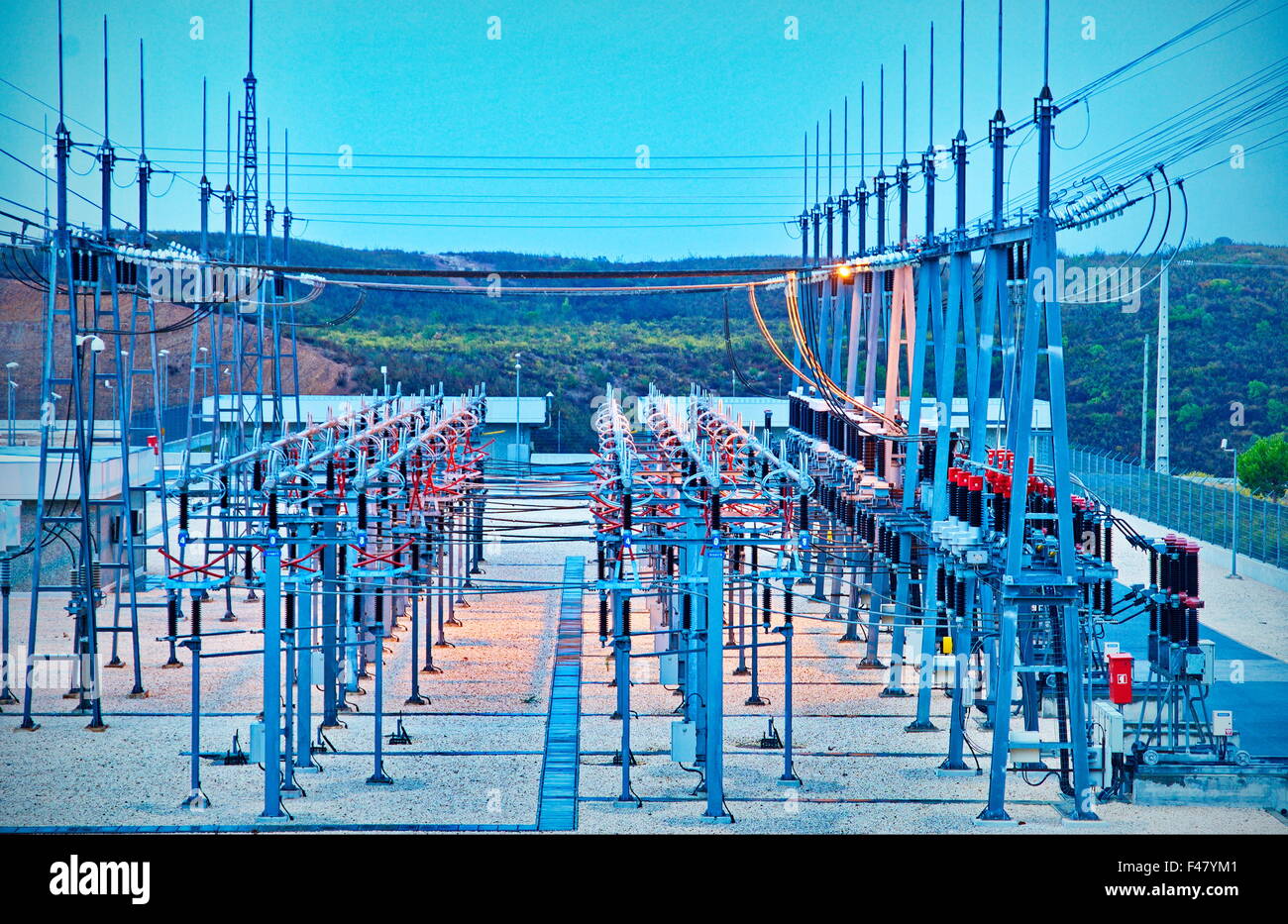 Power station for making Electricity. Shot before sunrise with cable ...