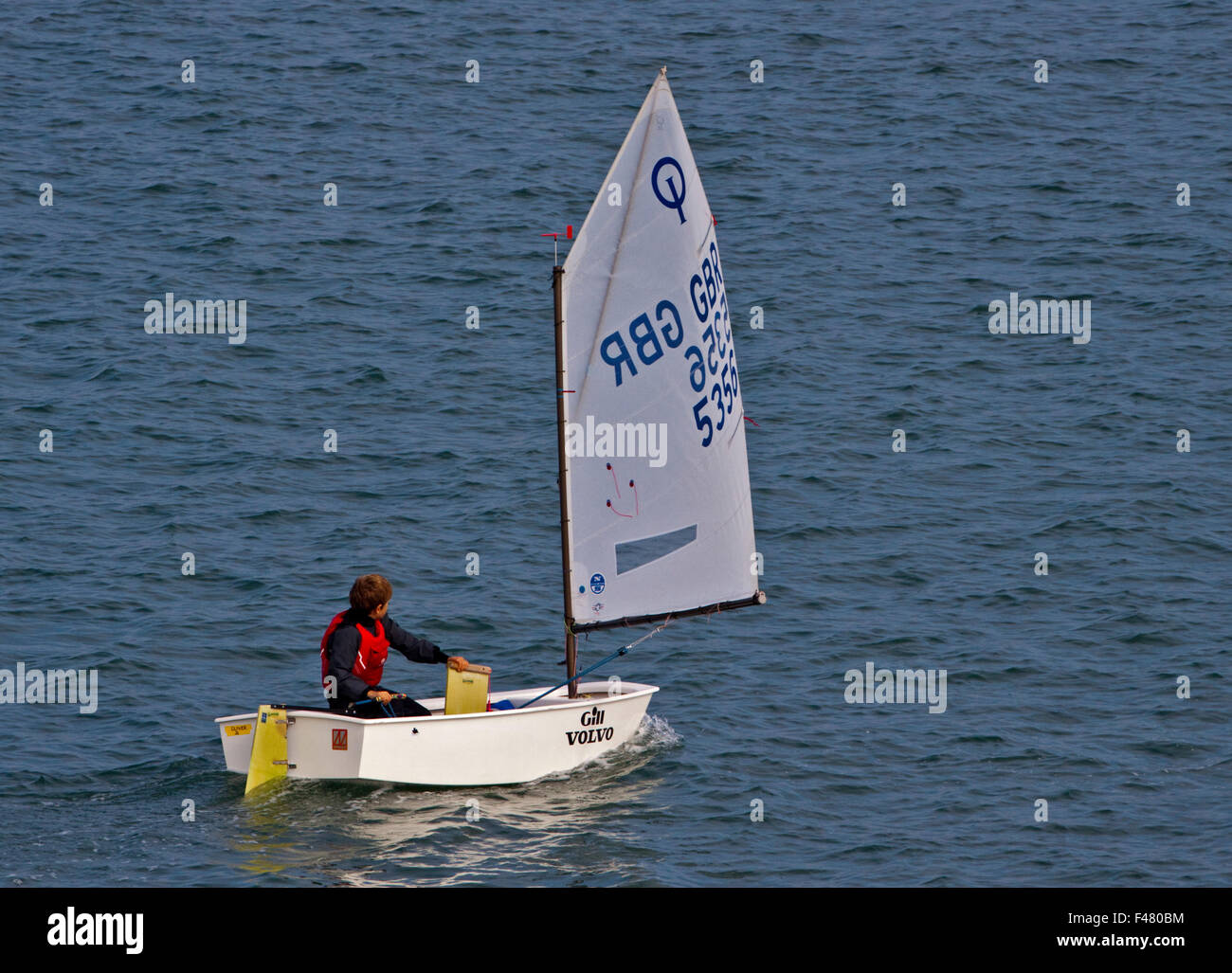 Youth learning to sail a Yacht in the Solent, Hampshire, England Stock ...