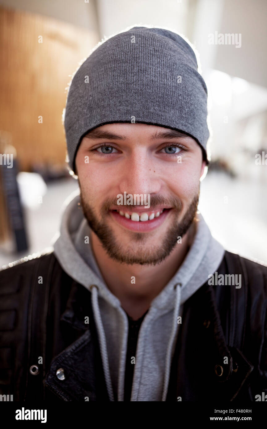 Portrait of a smiling man wearing a cap, Norway Stock Photo - Alamy
