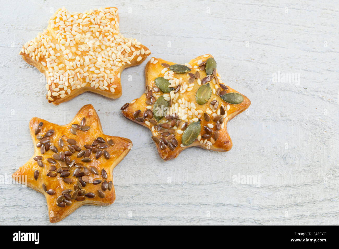 Homemade star shaped pastry on white wooden table Stock Photo - Alamy