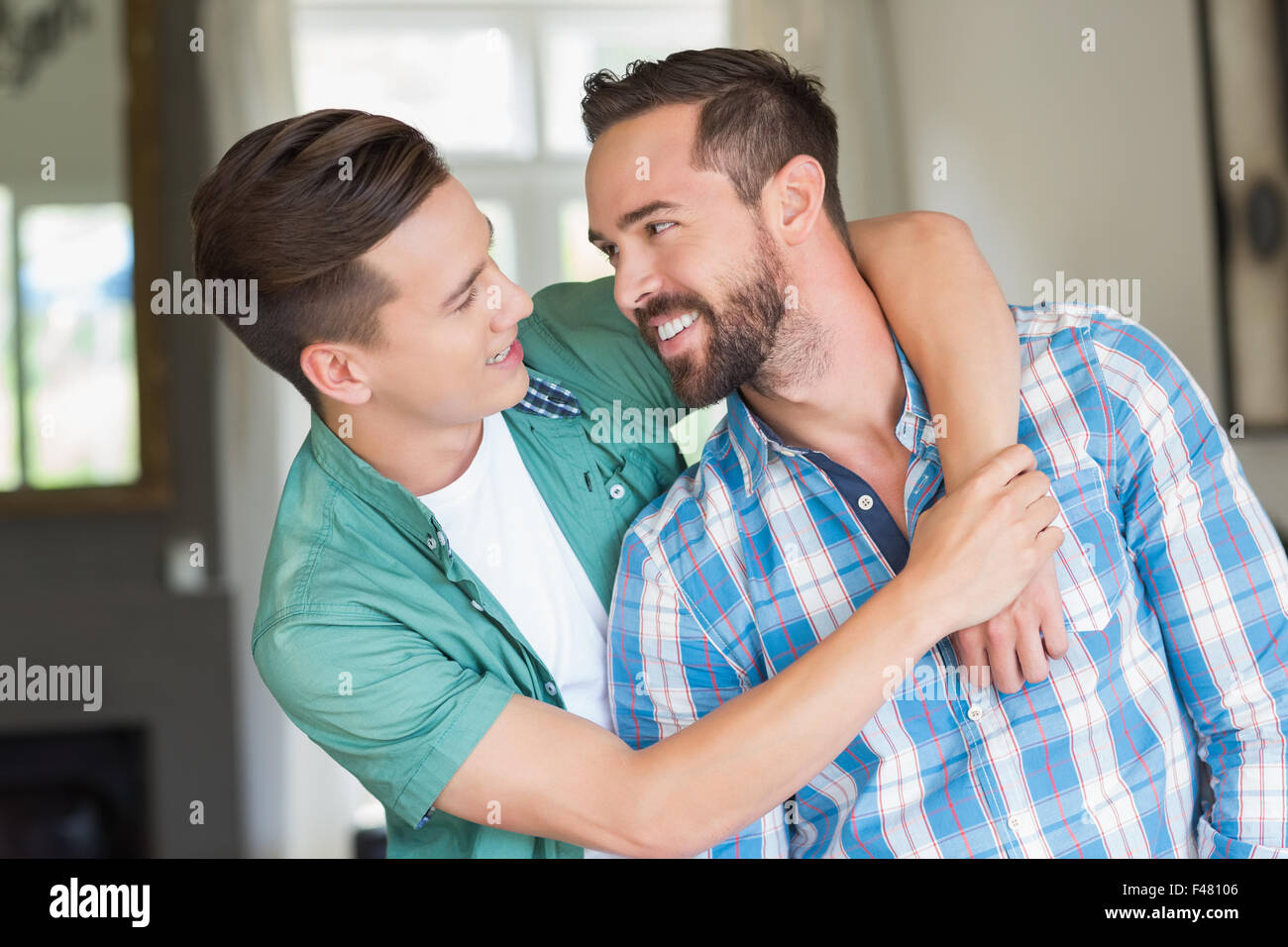 Homosexual couple men looking each other Stock Photo - Alamy