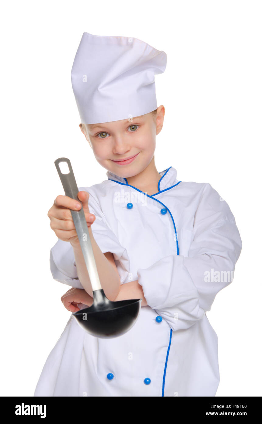 Young chef with a ladle Stock Photo - Alamy